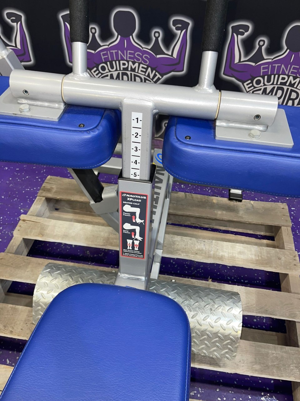 Buy Nautilus XPLOAD Seated Calf Raise Online | Fitness Equipment Empire